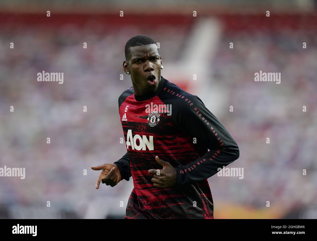 Paul Pogba of Manchester United named on the bench warms up before the ...
