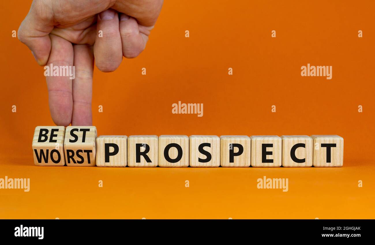 Best or worst prospect symbol. Businessman turns wooden cubes and ...