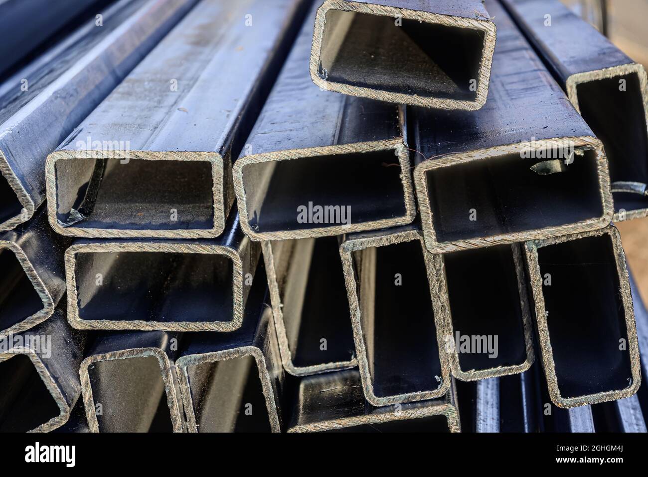 Metal pipes made of rectangular profile in a commercial warehouse Stock ...