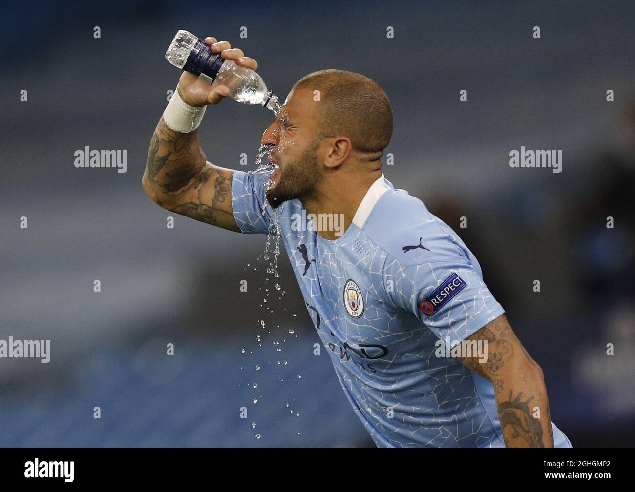 Kyle Walker of Manchester City drenches himself in water before the ...