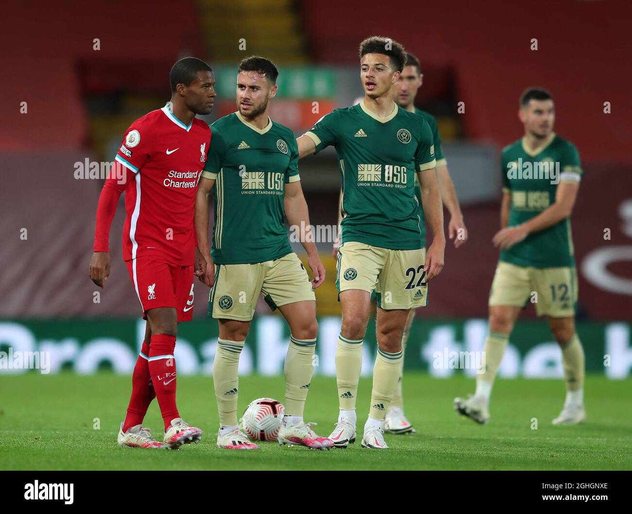 George Baldock of Sheffield Utd checks on Georginio Wijnaldum of ...