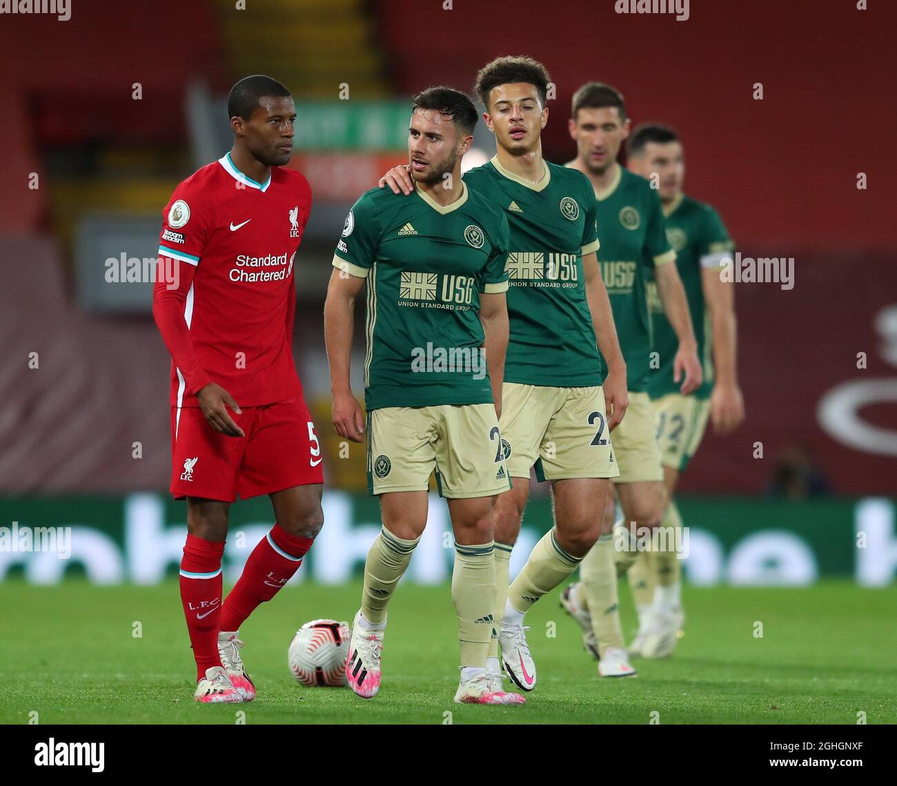 George Baldock of Sheffield Utd checks on Georginio Wijnaldum of ...