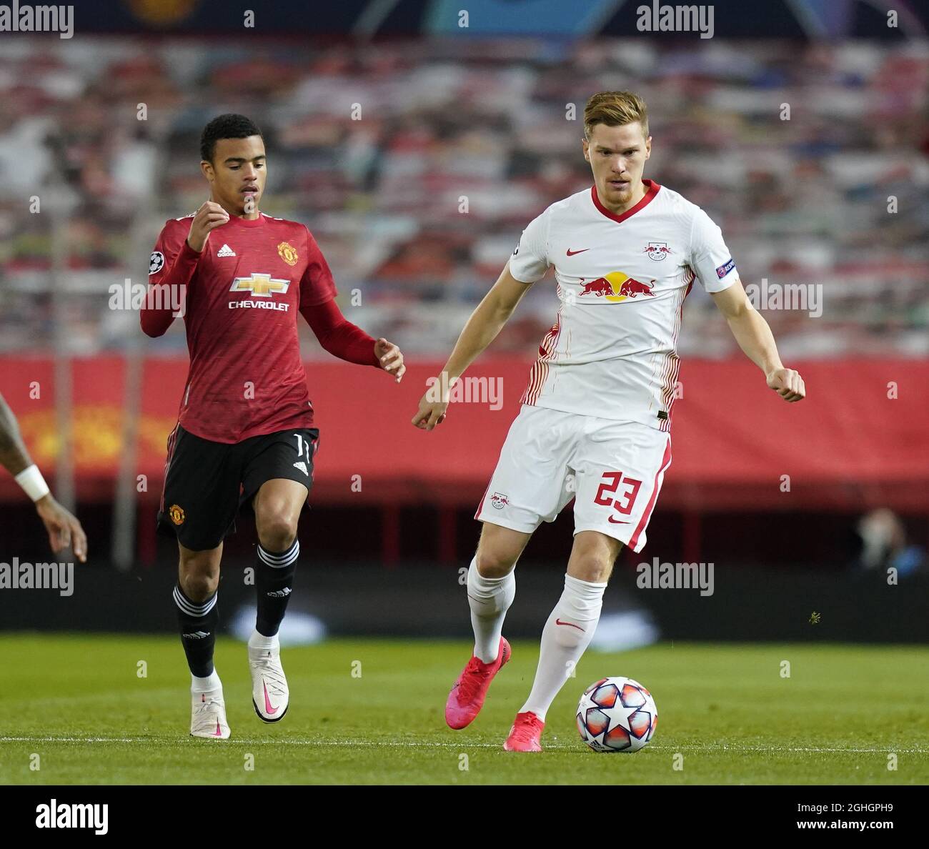 Mason Greenwood of Manchester United chases Marcel Halstenberg of RB ...
