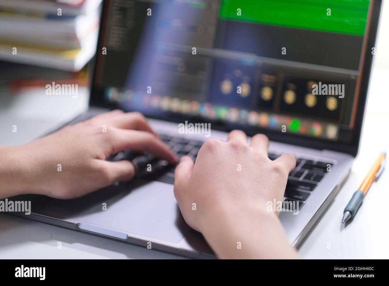 Close up of student using laptop to study and research project and ...