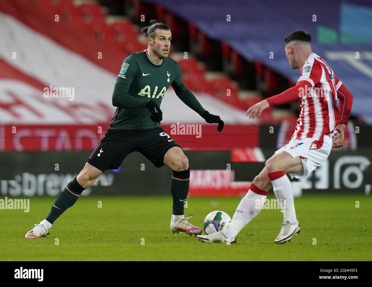Gareth Bale of Tottenham takes on James McClean of Stoke City during ...