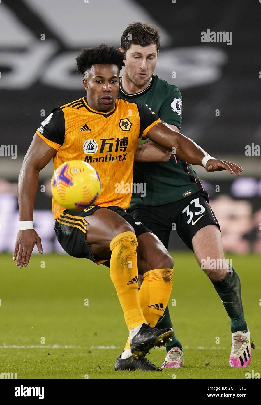 Adama Traore of Wolverhampton Wanderers and Ben Davies of Tottenham during the Premier League ...