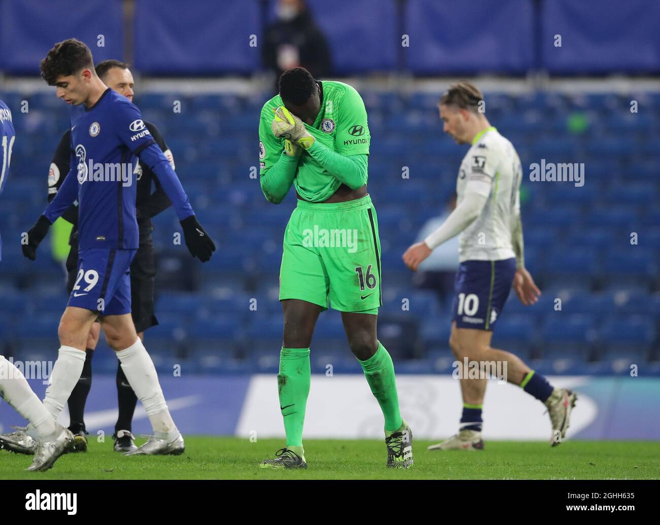 Edouard Mendy of Chelsea wipes his face during the Premier League match ...