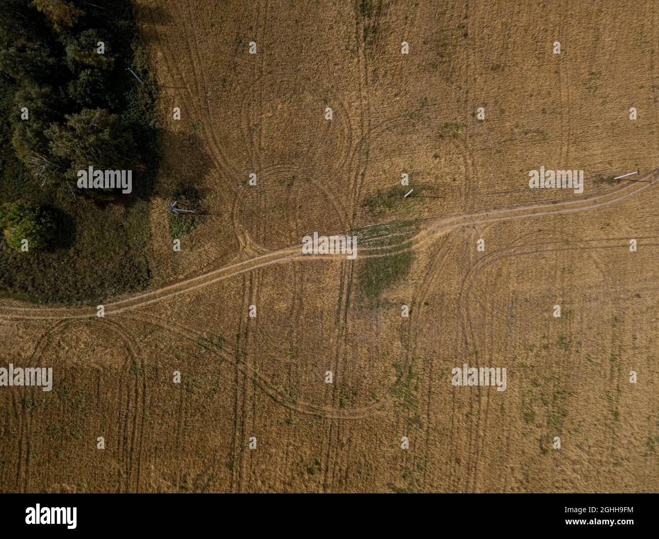 Aerial view of plowed agricultural field ready for planting, top view ...