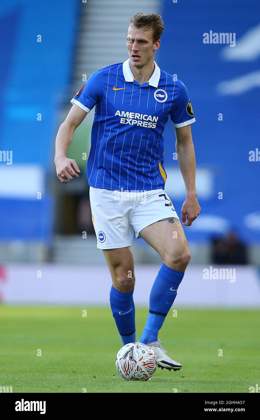 Dan Burn of Brighton during the FA Cup match at the AMEX Stadium ...