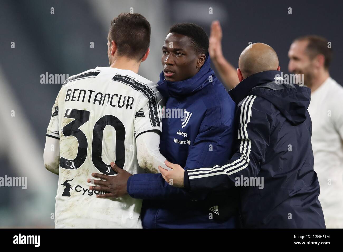 Daouda Peeters of Juventus congratulates team mate Rodrigo Bentancur ...