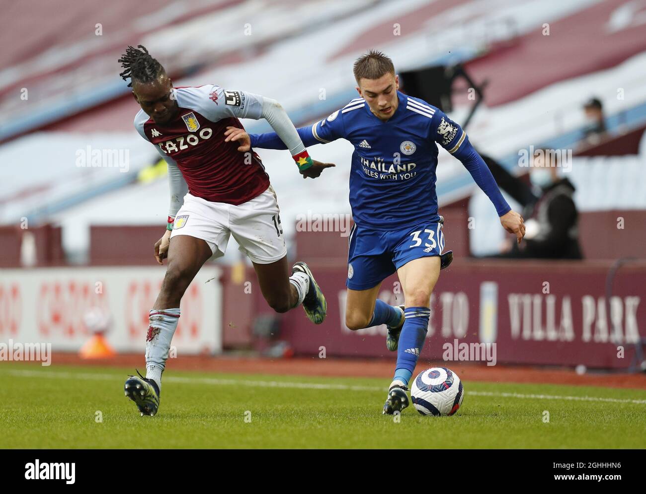 Luke Thomas of Leicester City tussles with Bertrand Traore of Aston ...