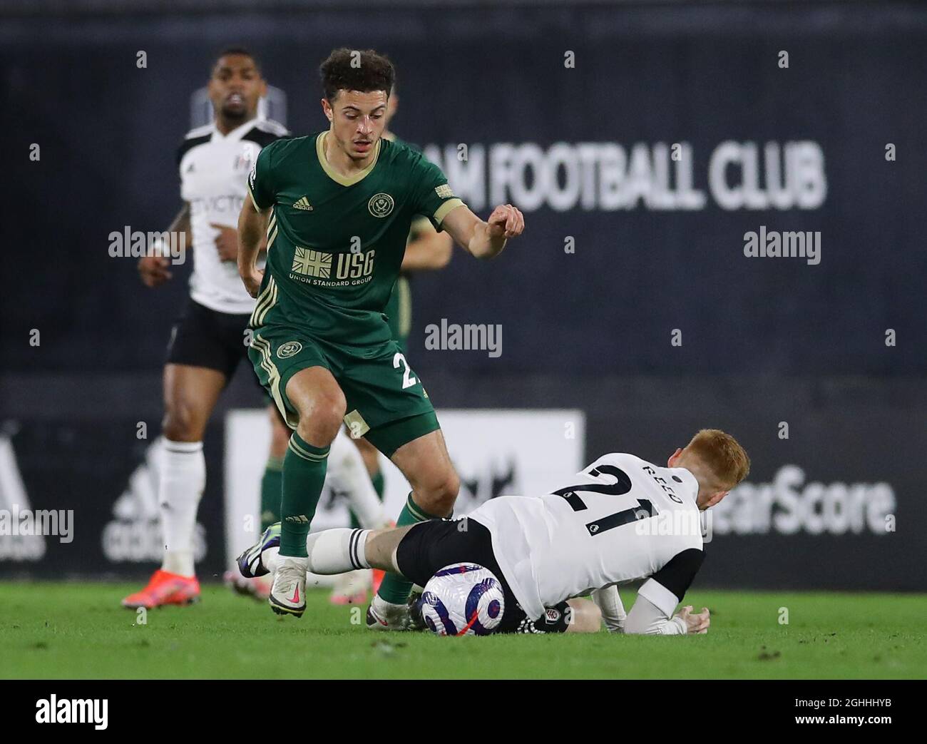 Ethan Ampadu of Sheffield Utd tackles Harrison Reed of Fulham during ...