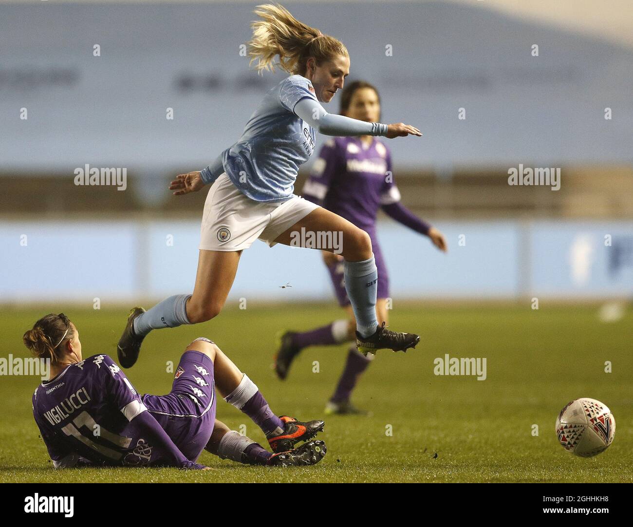 Laura Coombs of Manchester City Women jumps over Valery Vigilucci of ...