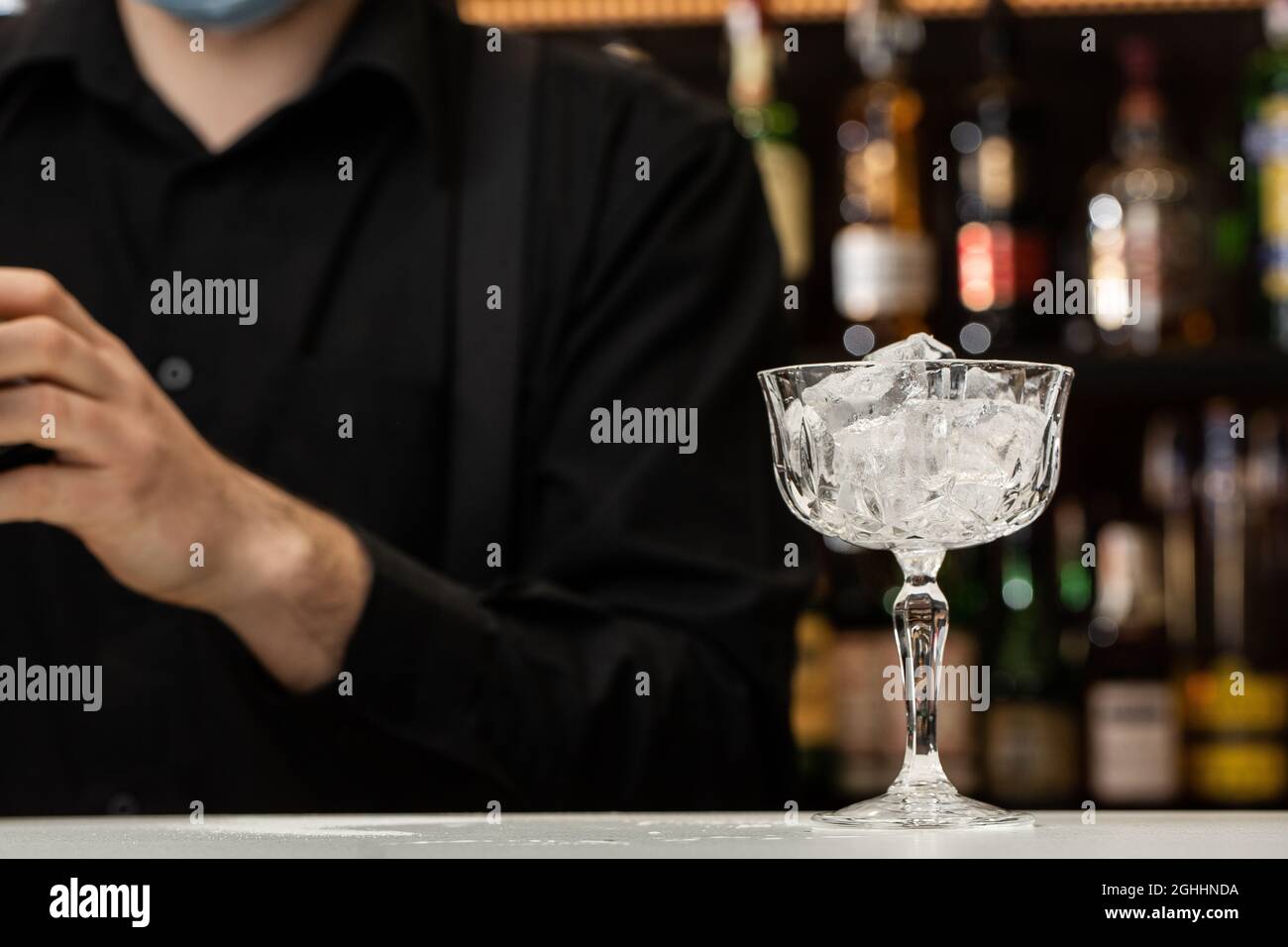 Male bartender rubs transparent glass hi-res stock photography and ...