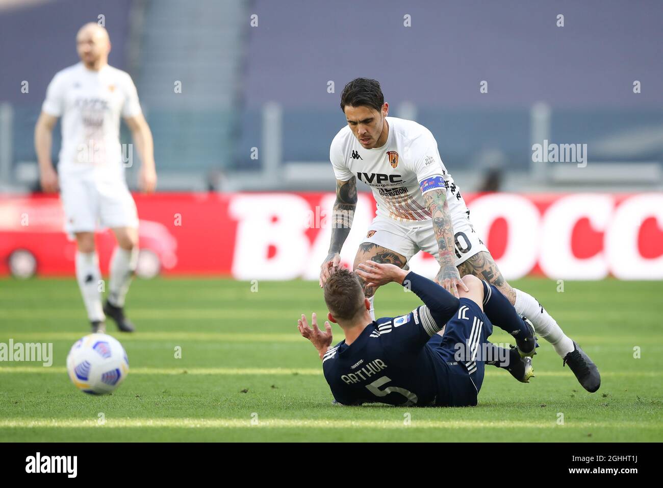 Arthur of Juventus is fouled by Nicolas Viola of Benevento Calcio ...