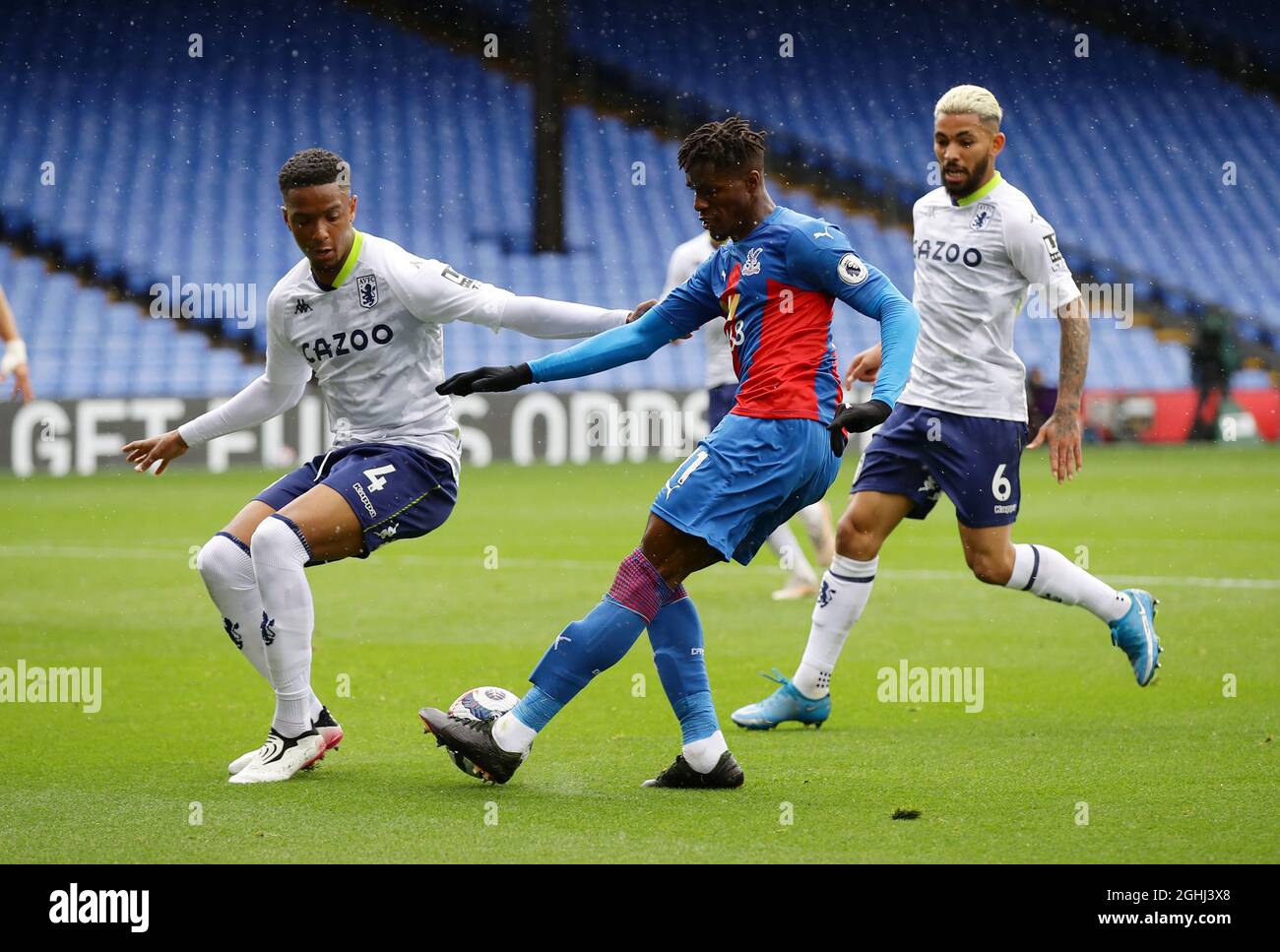 London, England, 16th May 2021. Wilfried Zaha of Crystal Palace shoots ...