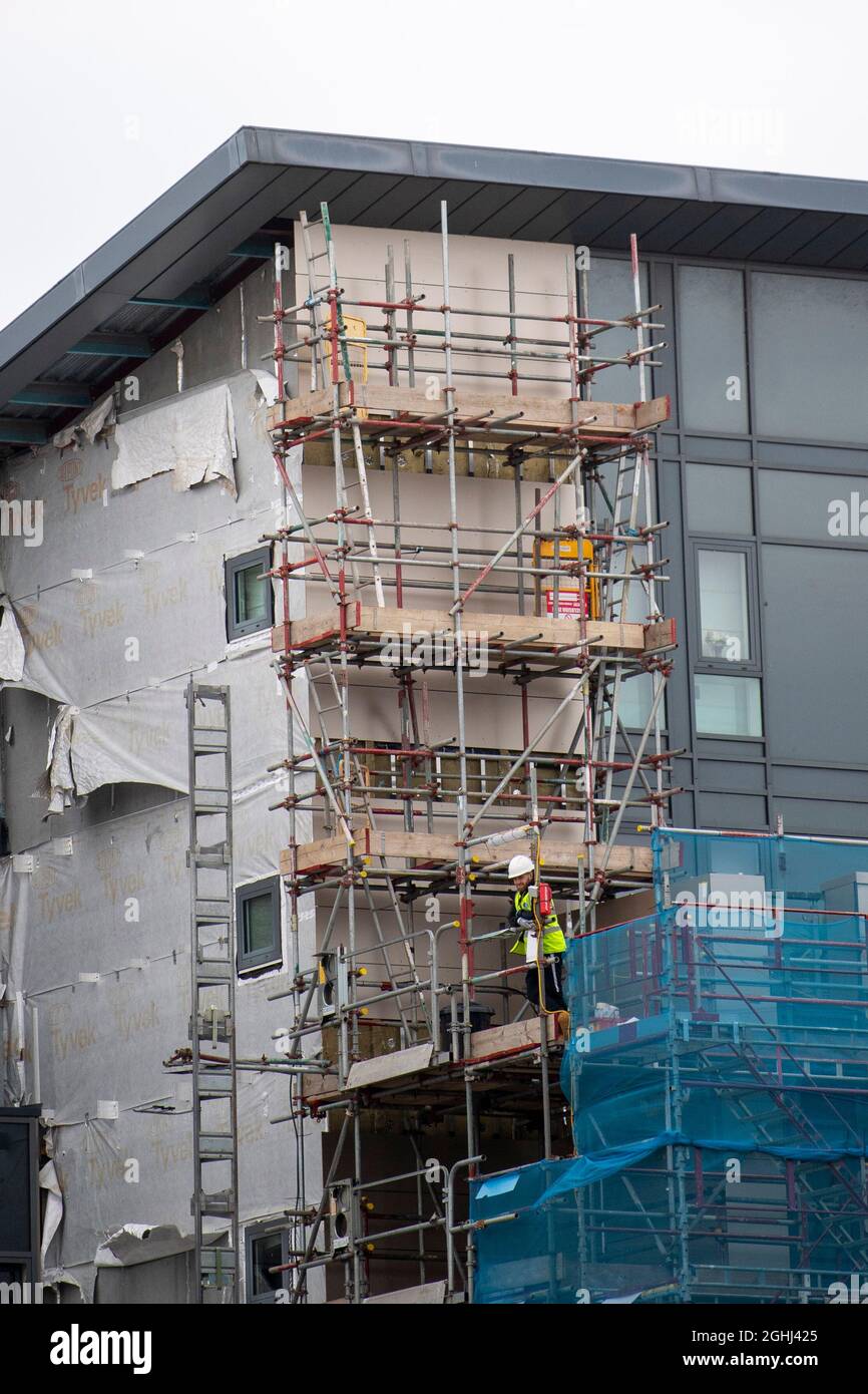 Cladding removed on a building in Cardiff, Wales, United Kingdom Stock ...