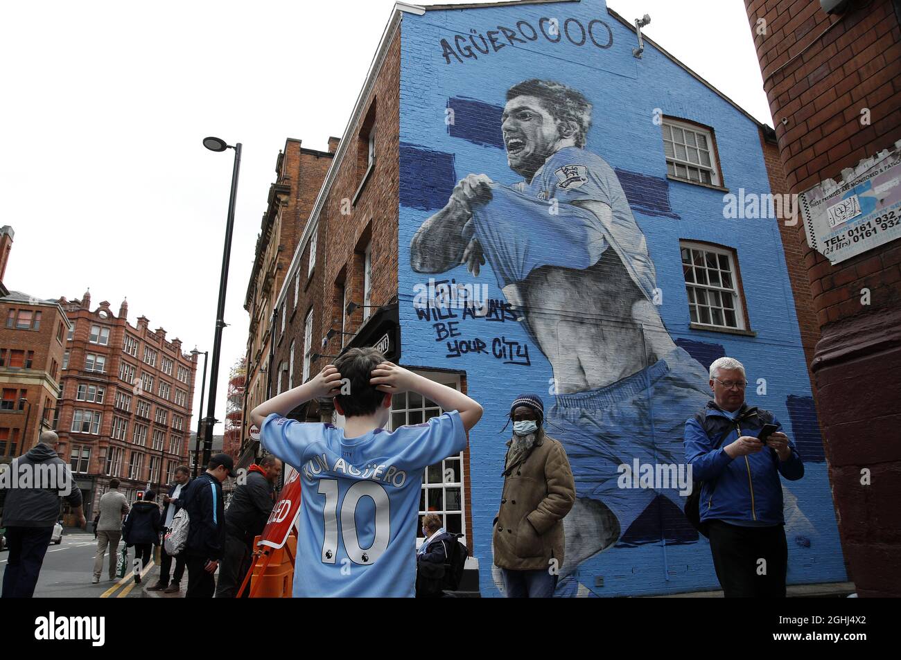Manchester, England, 23rd May 2021. Manchester City fans look at a ...