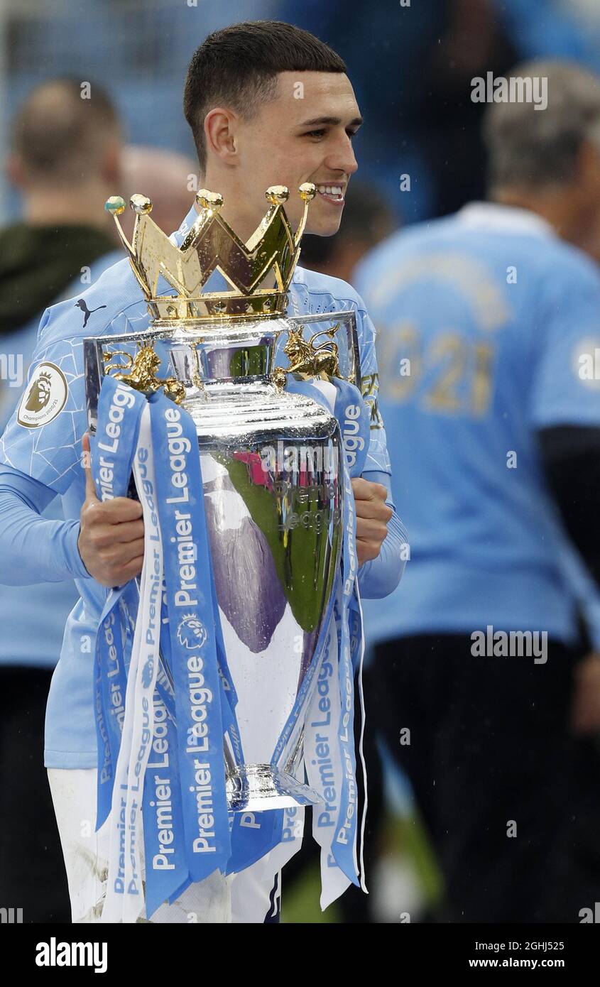 Manchester, England, 23rd May 2021. Phil Foden of Manchester City holds ...