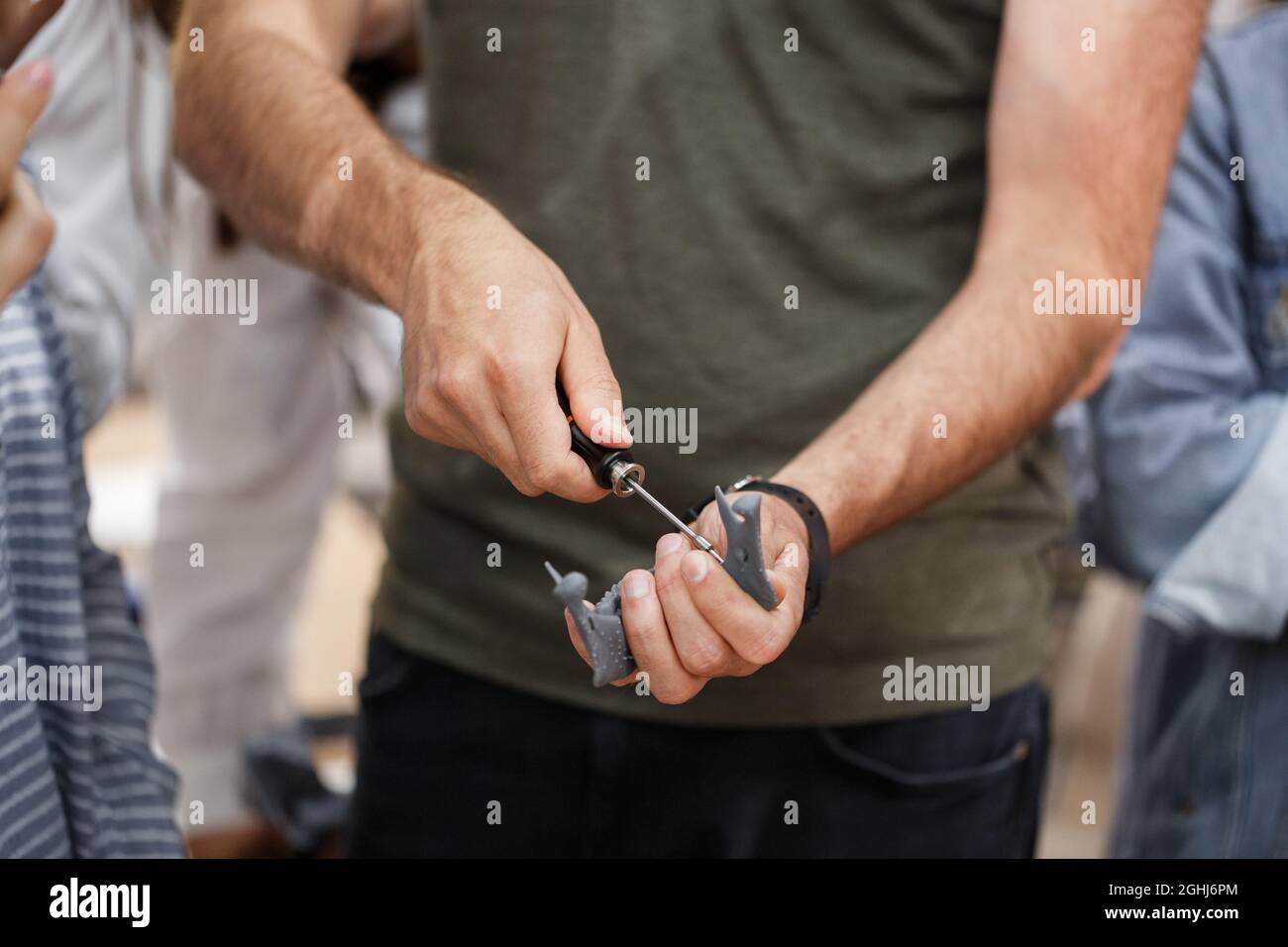 Dentist practice with mini screw model on dental model. Orthodontic ...