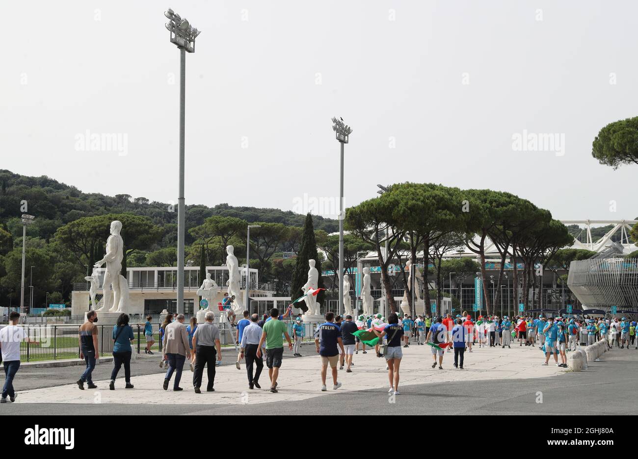 Rome, Italy, 20th June 2021. Fans walk beside marble statues on the way ...