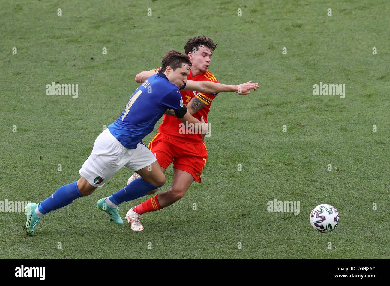 Rome, Italy, 20th June 2021. Federico Chiesa of Italy clashes with Neco ...