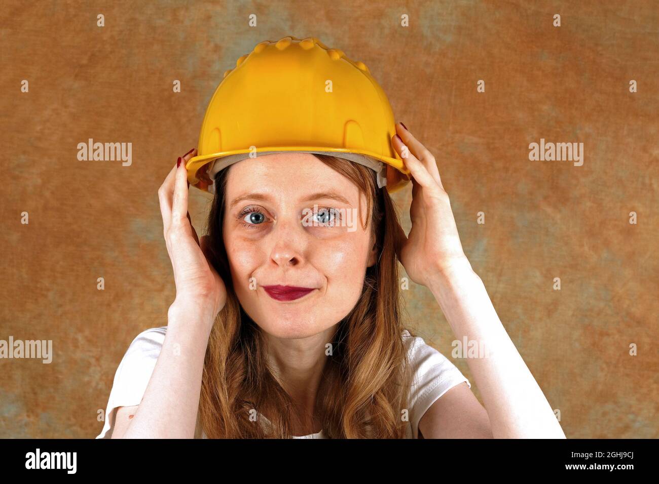Female industrial worker working in construction industry wearing ...