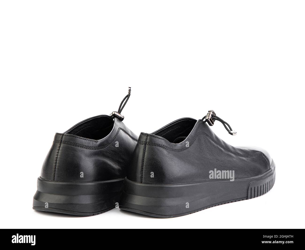 Black leather sneakers. Casual men's style. black rubber soles ...