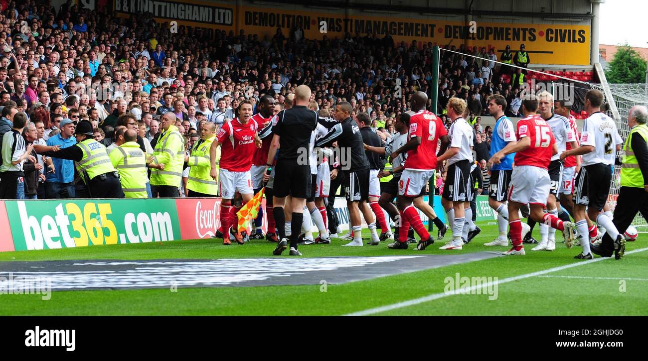 Derby and Nottingham Forest players and staff confront each other in ...