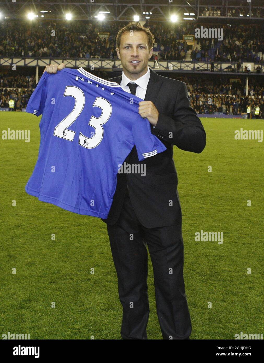 Half length eye contact smiling black suit mangsb hi-res stock ...