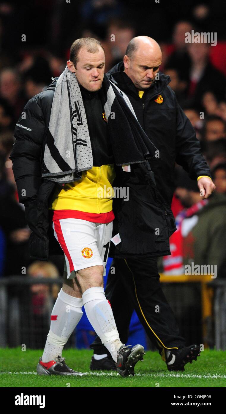 Proud Dad Wayne Rooney of Manchester United walks off at half time with ...
