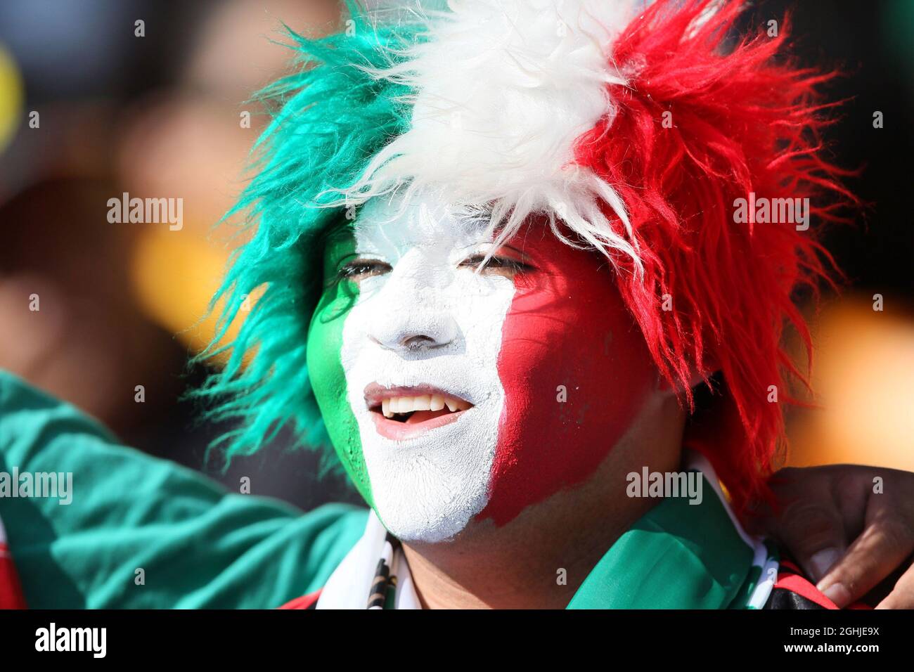 A Mexican fan looks on Stock Photo - Alamy