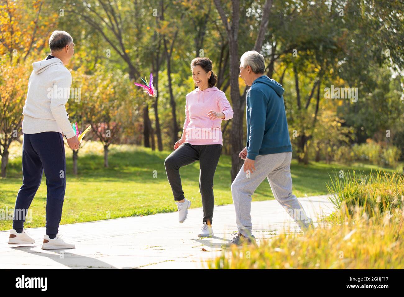 Cheerful senior adult relaxing in the park Stock Photo - Alamy