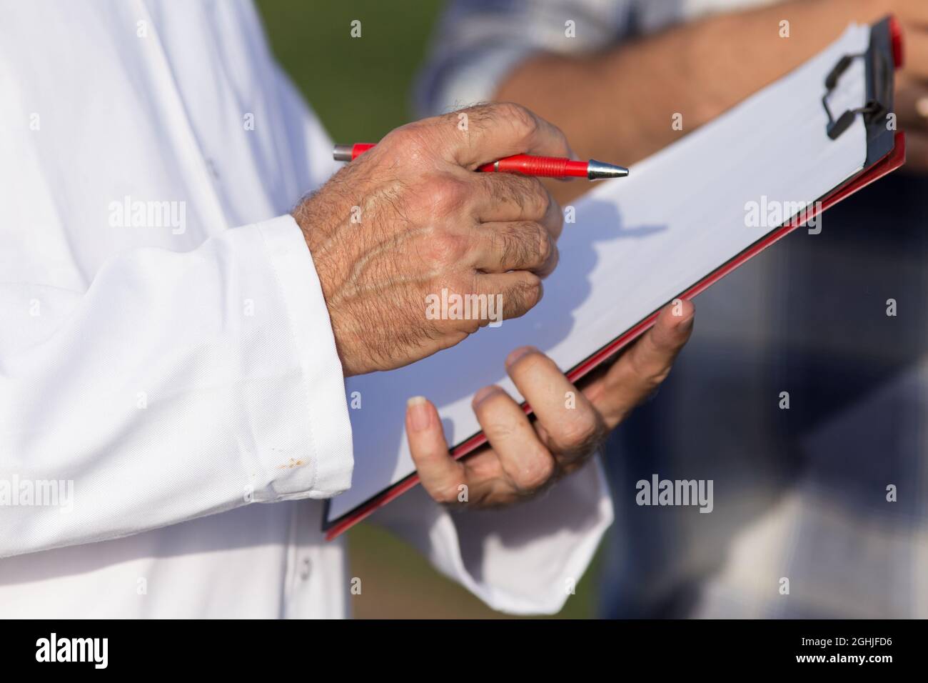 Senior person hands writing hi-res stock photography and images - Alamy