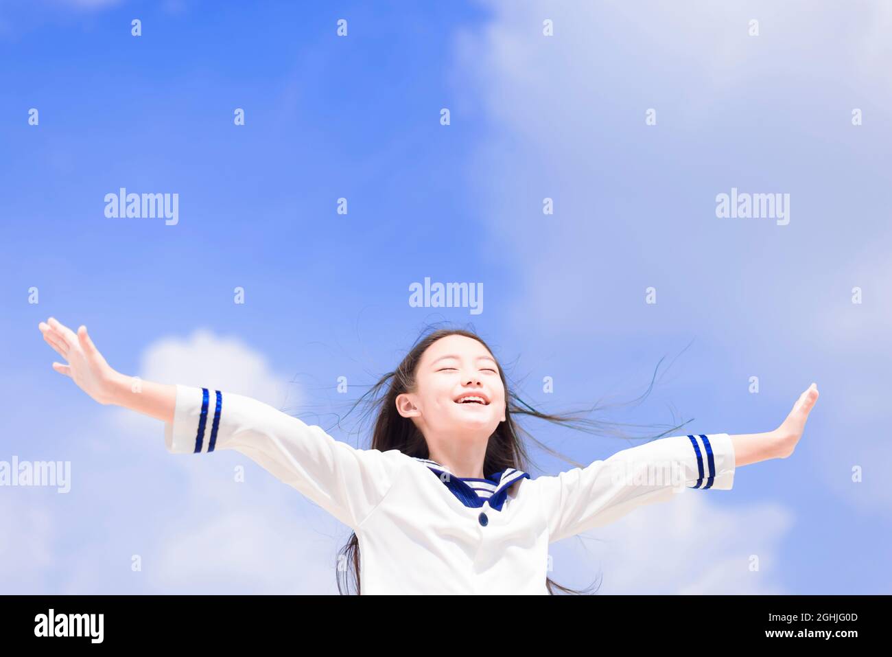 Happy girl raise hands up hi-res stock photography and images - Alamy