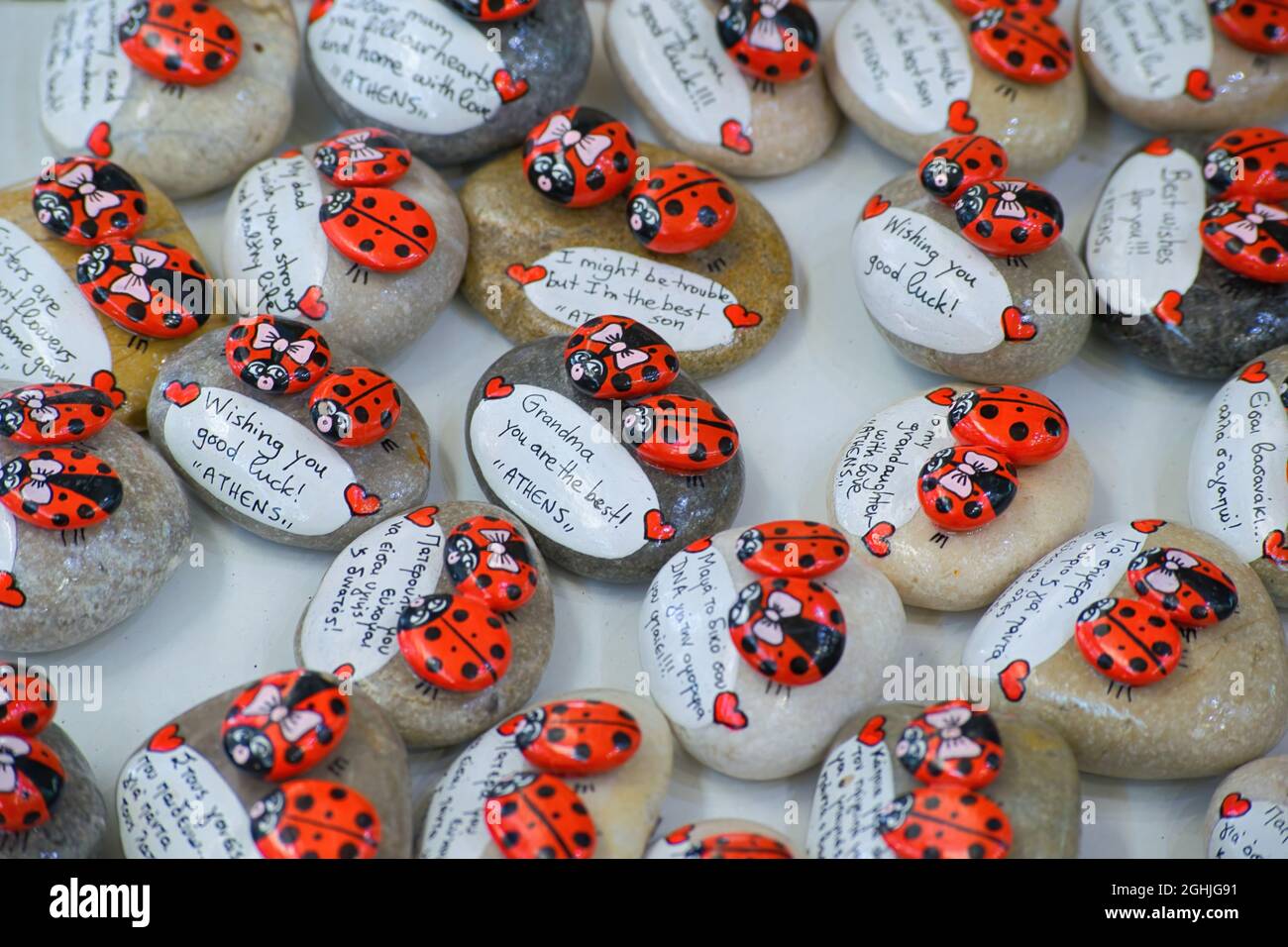 decorative stones, painted ladybugs with love messages Stock Photo - Alamy