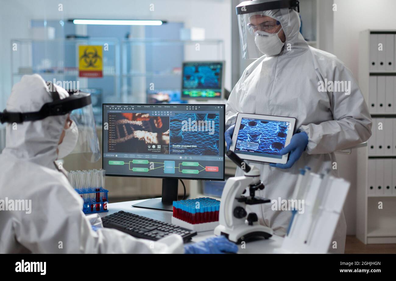 Medical team of scientist analyzing covid19 vaccine development ...