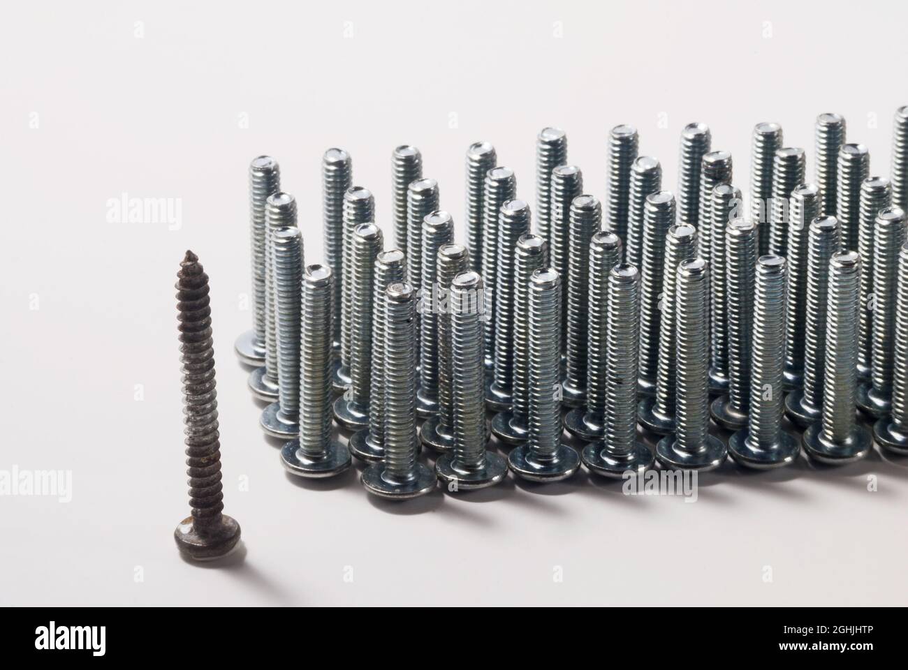 Group of silver screws and one old big screw Stock Photo - Alamy