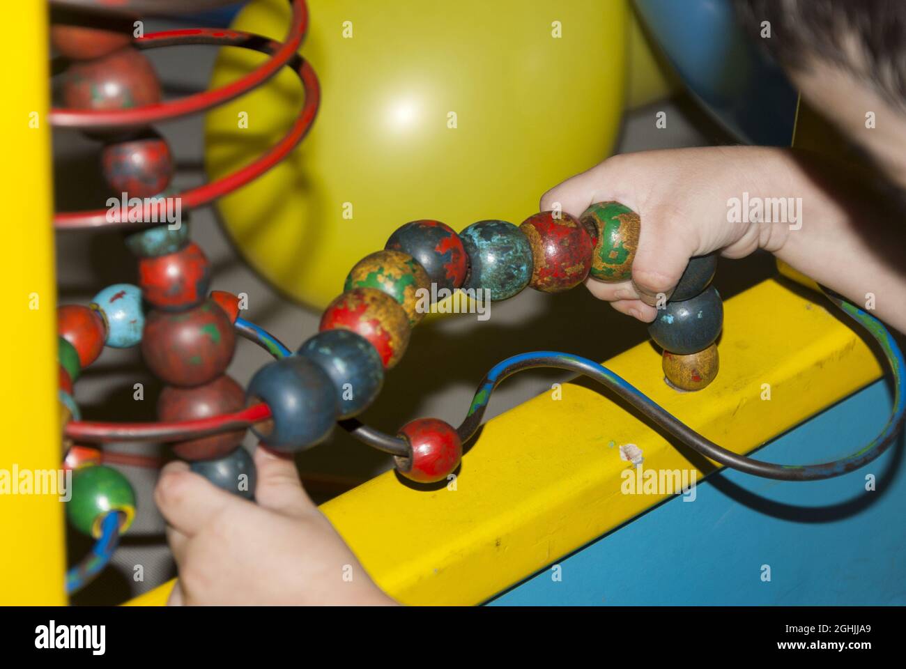 Child in colorful playground, birthday party Stock Photo - Alamy