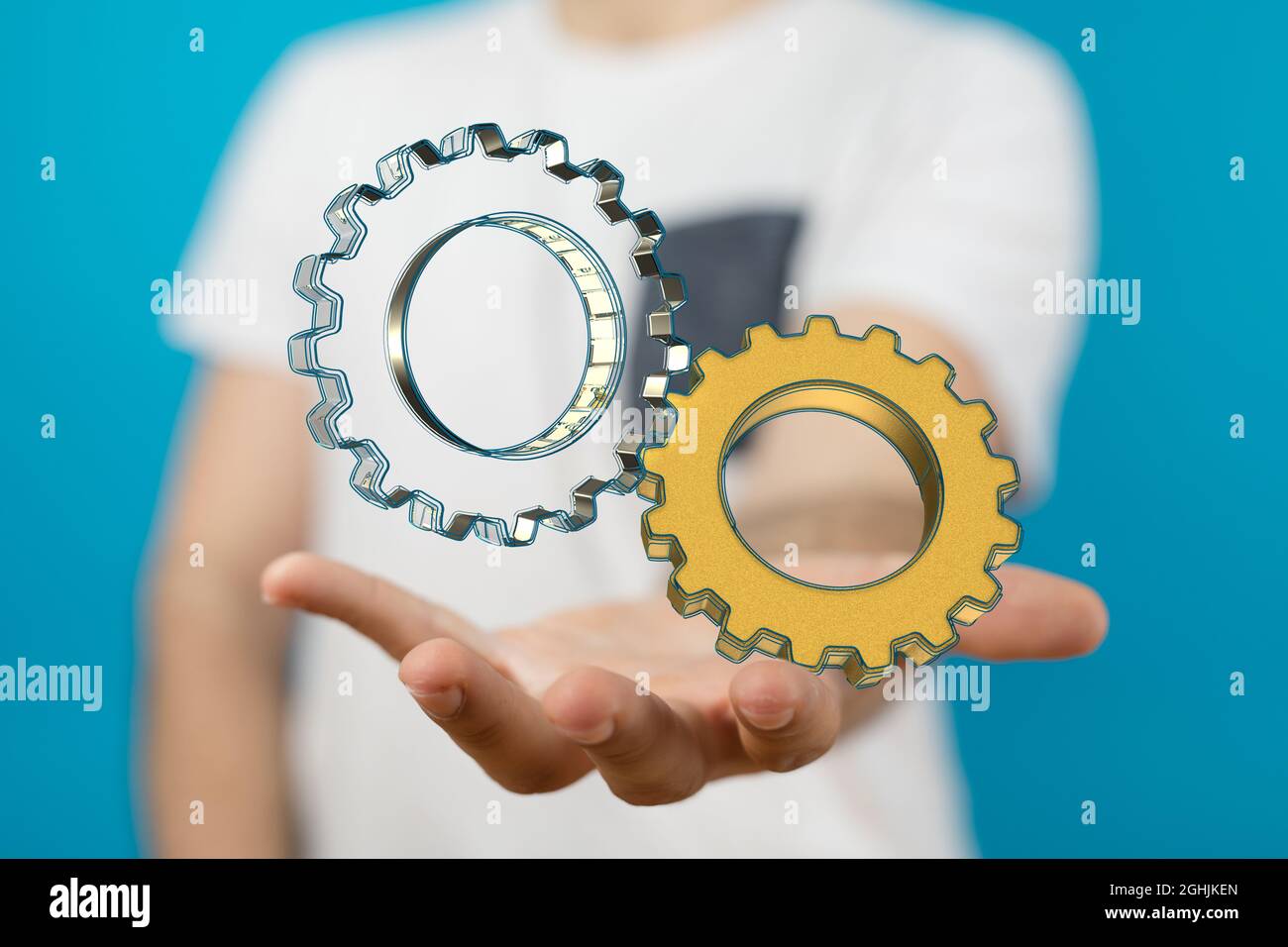 3D rendered gears held in a person's hand Stock Photo - Alamy