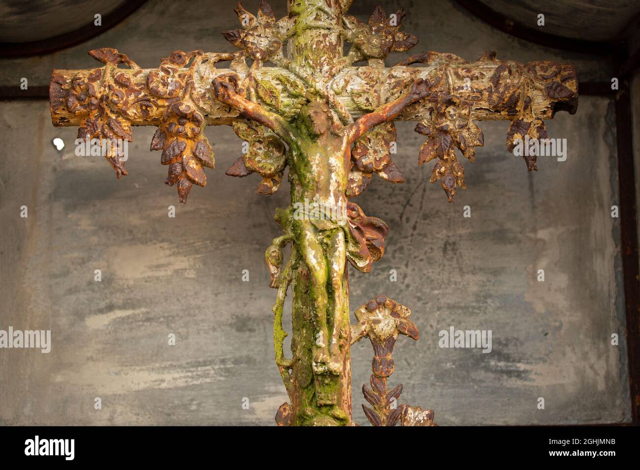 Textured statue of Jesus Christ in a small countryside french cemetery ...