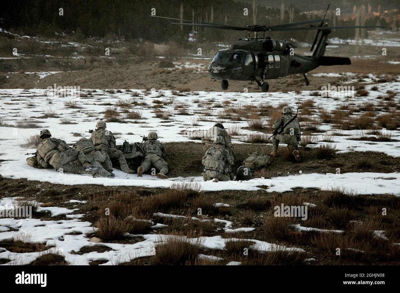 U.S. Army Soldiers establish a security perimeter after being inserted ...