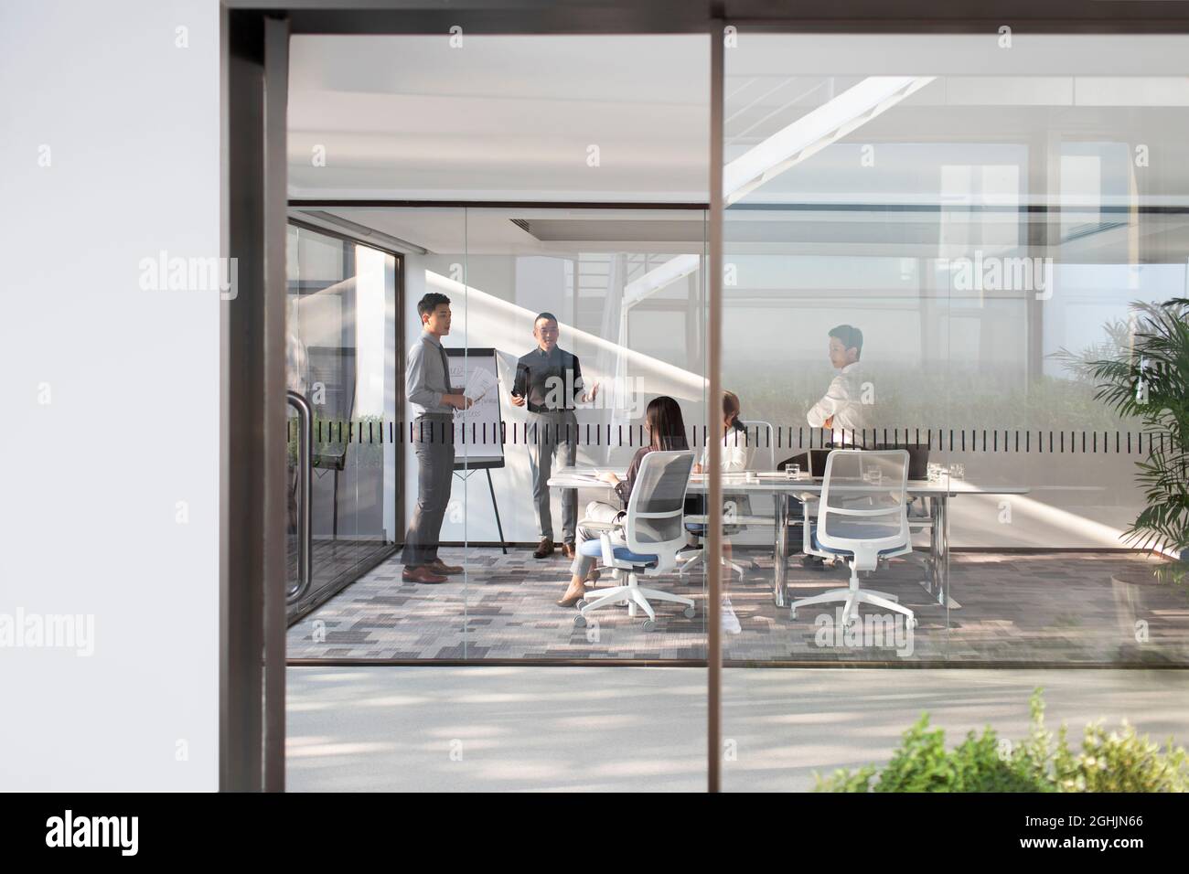 Business people having meeting in board room Stock Photo - Alamy