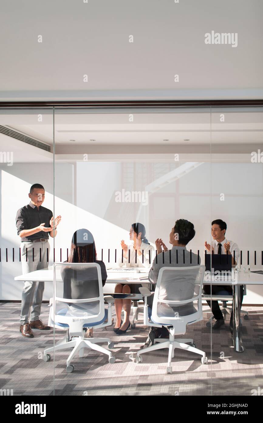 Side by side conference table manager confidence teamwork office ...