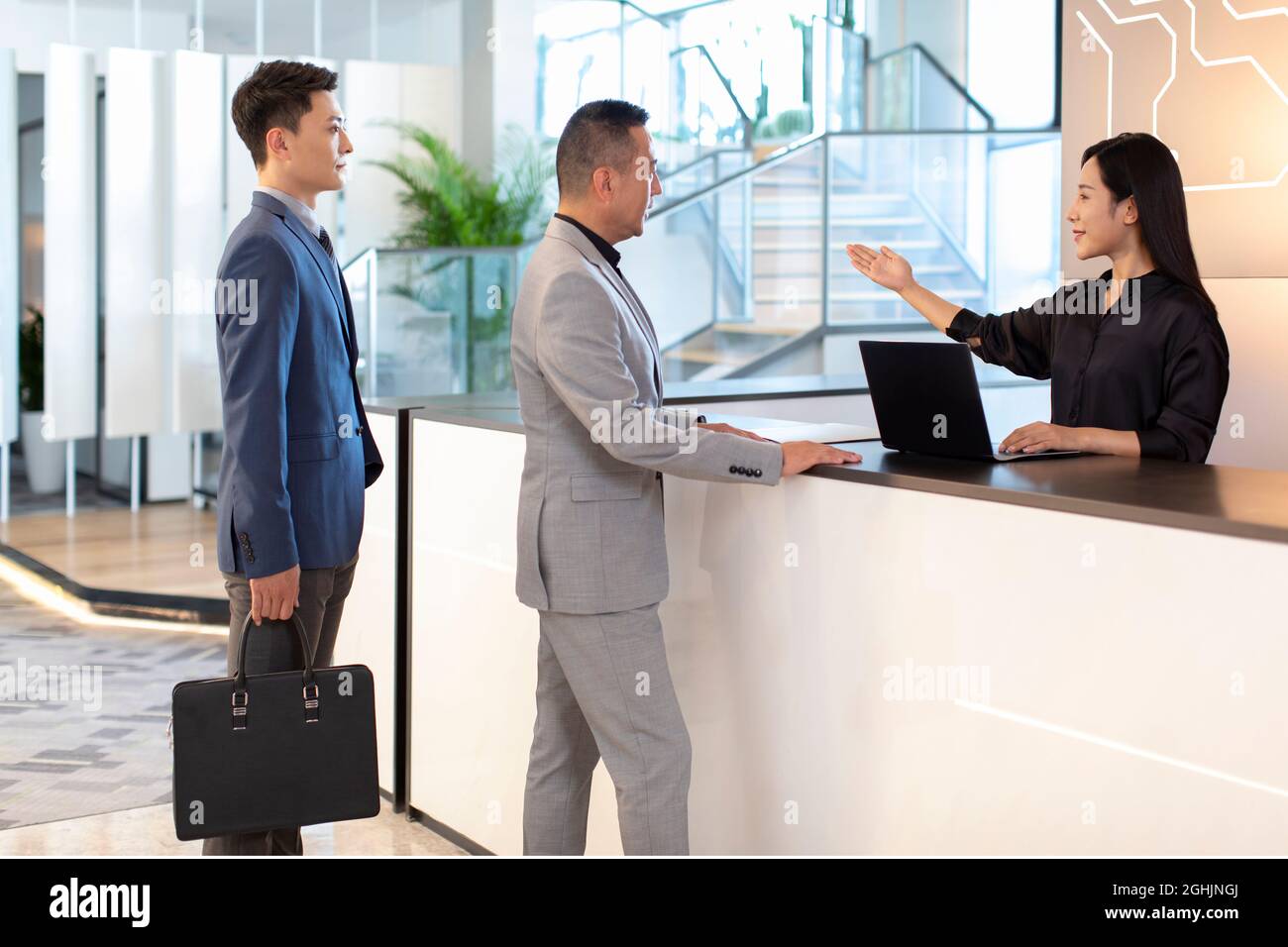 Smiling standing face to face communication authority hi-res stock ...