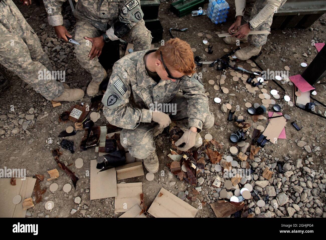 U.S. Army Pfc. Jerrod Lynch from Dallas, Texas, removes packaging from ...