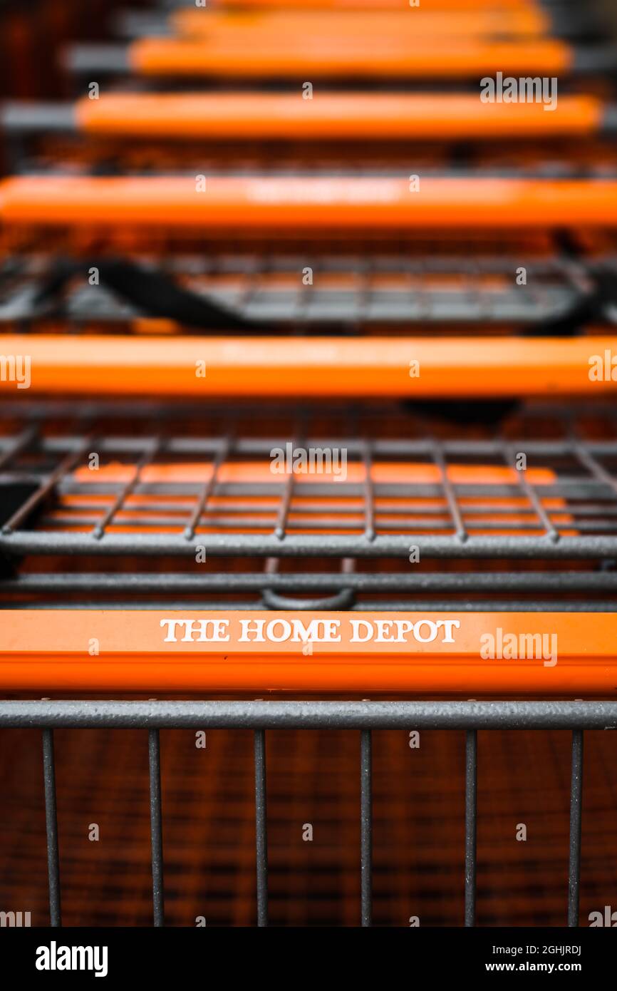 Issaquah, WA, USA - September 06, 2021; The Home Depot shopping carts with store name on handle ...