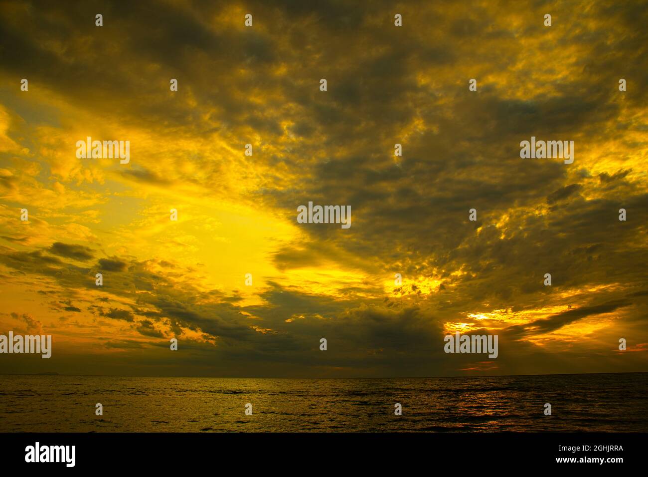 texture pre-sunset sky with black clouds in bad weather over the sea ...