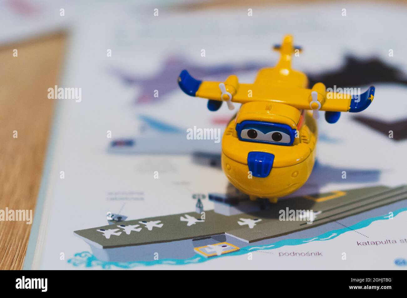 POZNAN, POLAND - Oct 21, 2018: A yellow Super Wings Donnie toy model ...