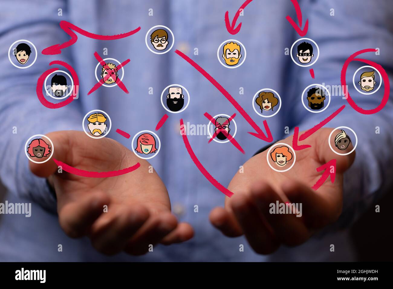 People icons in the network team hovering over a man's hand Stock Photo ...